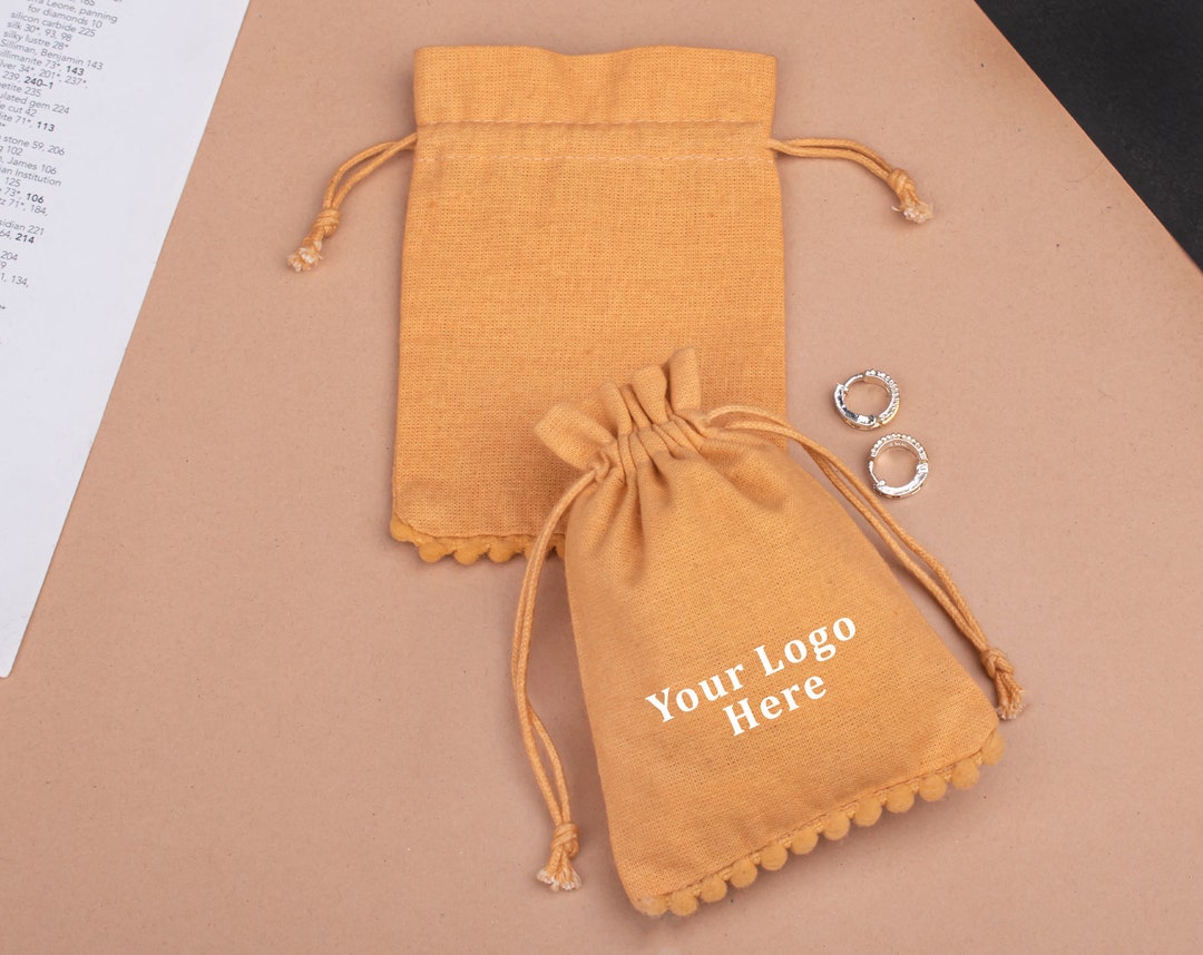 Yellow Golden Bottom Pompom Custom Drawstring Pouches With Personalized ...