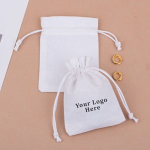 100 Pcs of White Small Cotton Drawstring Pouches | Customized Jewellery ...