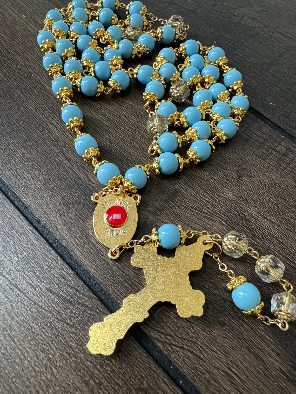 Heavenly Whisper: Handcrafted Gold Rosary With Baby Blue Beads & Saint ...