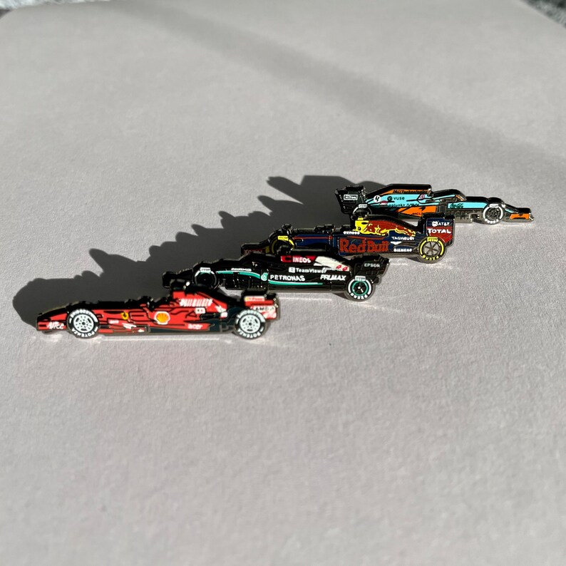 Formula 1 Enamel Pins: Mercedes, Red Bull, Mclaren, Ferrari. - Etsy