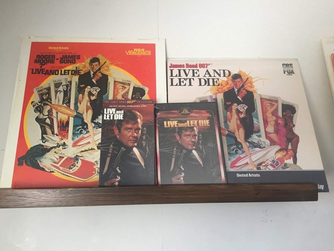 A Wall Display of Roder Moore as James Bond 007 in the Movie Live and ...