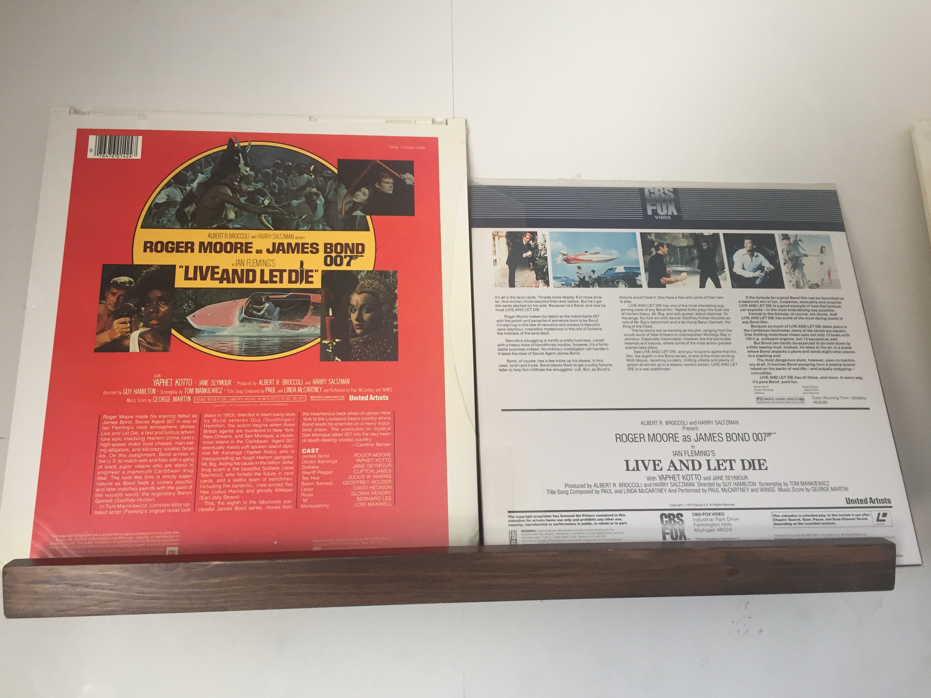 A Wall Display of Roder Moore as James Bond 007 in the Movie Live and ...