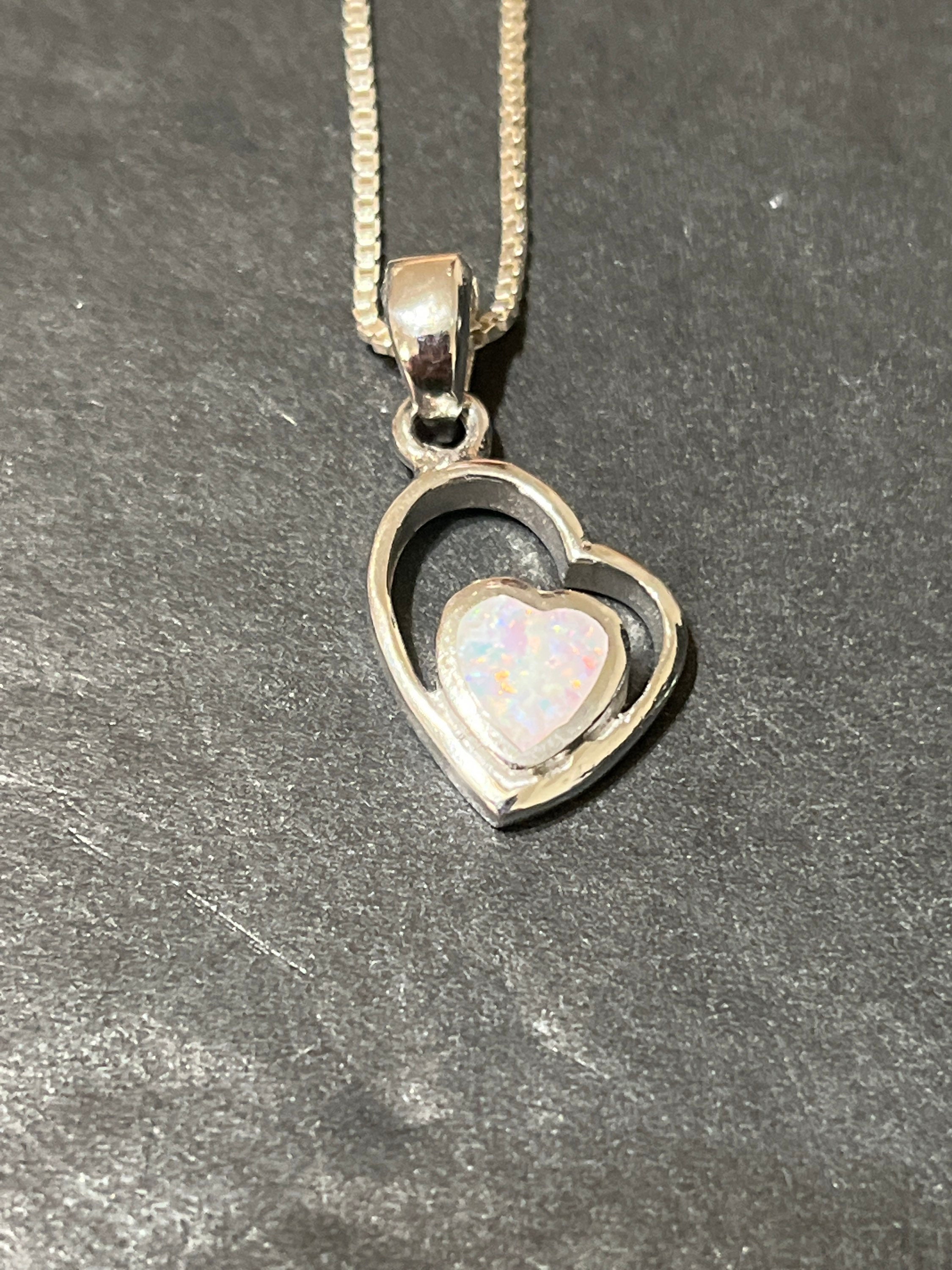 ABUNDANT RED LOVE HEART SHAPED AUSTRALIAN WHITE OPAL