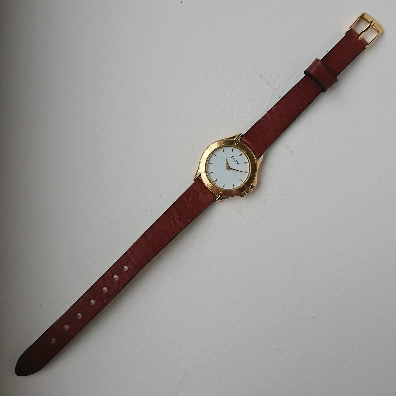 Vintage Bulova Gold Roman Numerals on Bezel 90s Rare | Etsy