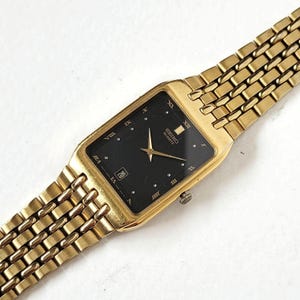 Vintage Seiko Black&gold 90s Unique - Etsy