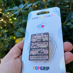 The Bookshelf Tarot Card Popsocket™, the Reader Tarot Car Popgrip™, the ...