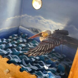 Pelican Automata. Oil Painting and Bird Flying Over the Sea, Kinetic ...