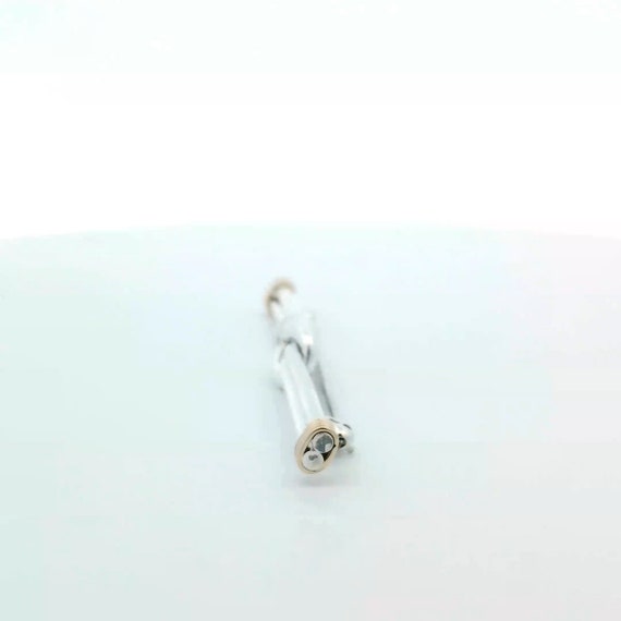 Introducing our versatile, Sterling Silver and 18k Ye… - Gem