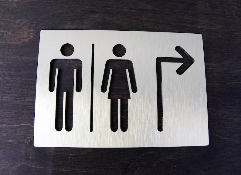 Señal de flecha direccional para baño: flechas que apuntan hacia la ...