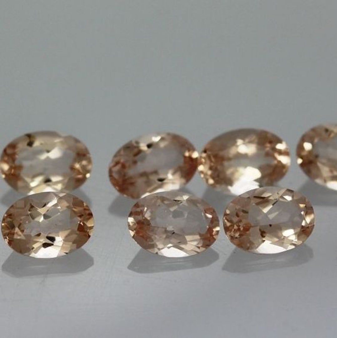 Piedras preciosas sueltas de corte facetado ovalado de morganita de ... Piedras preciosas sueltas de corte facetado ovalado de morganita de ...