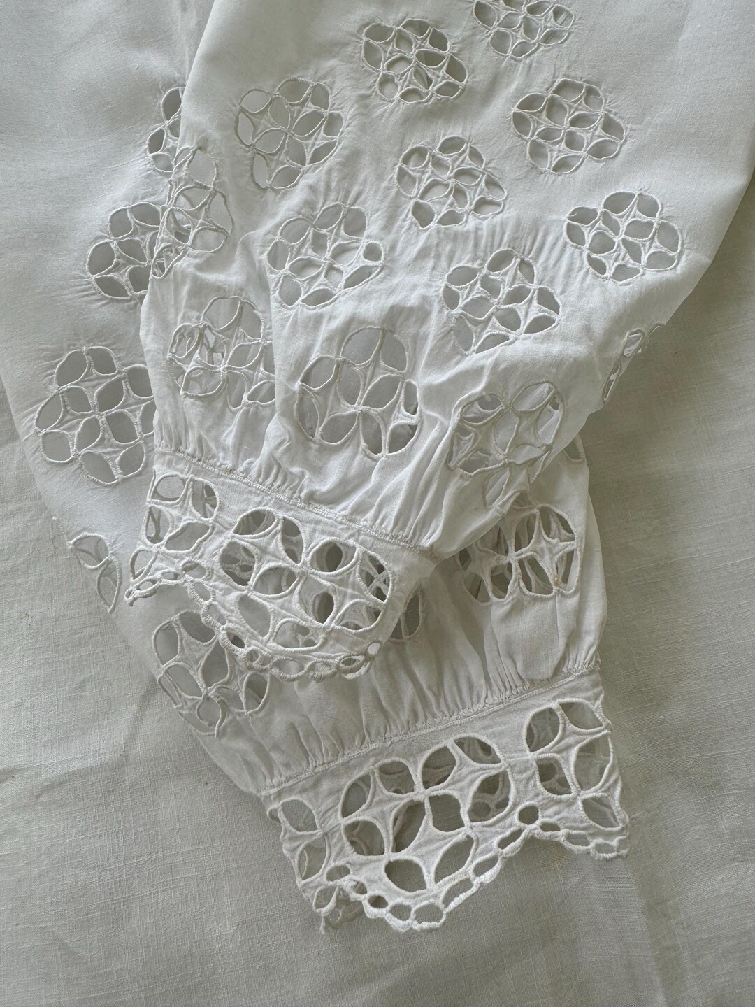 A Pair of Hand Embroidered Cutwork Sleeves With Monograms. A Pair of ...