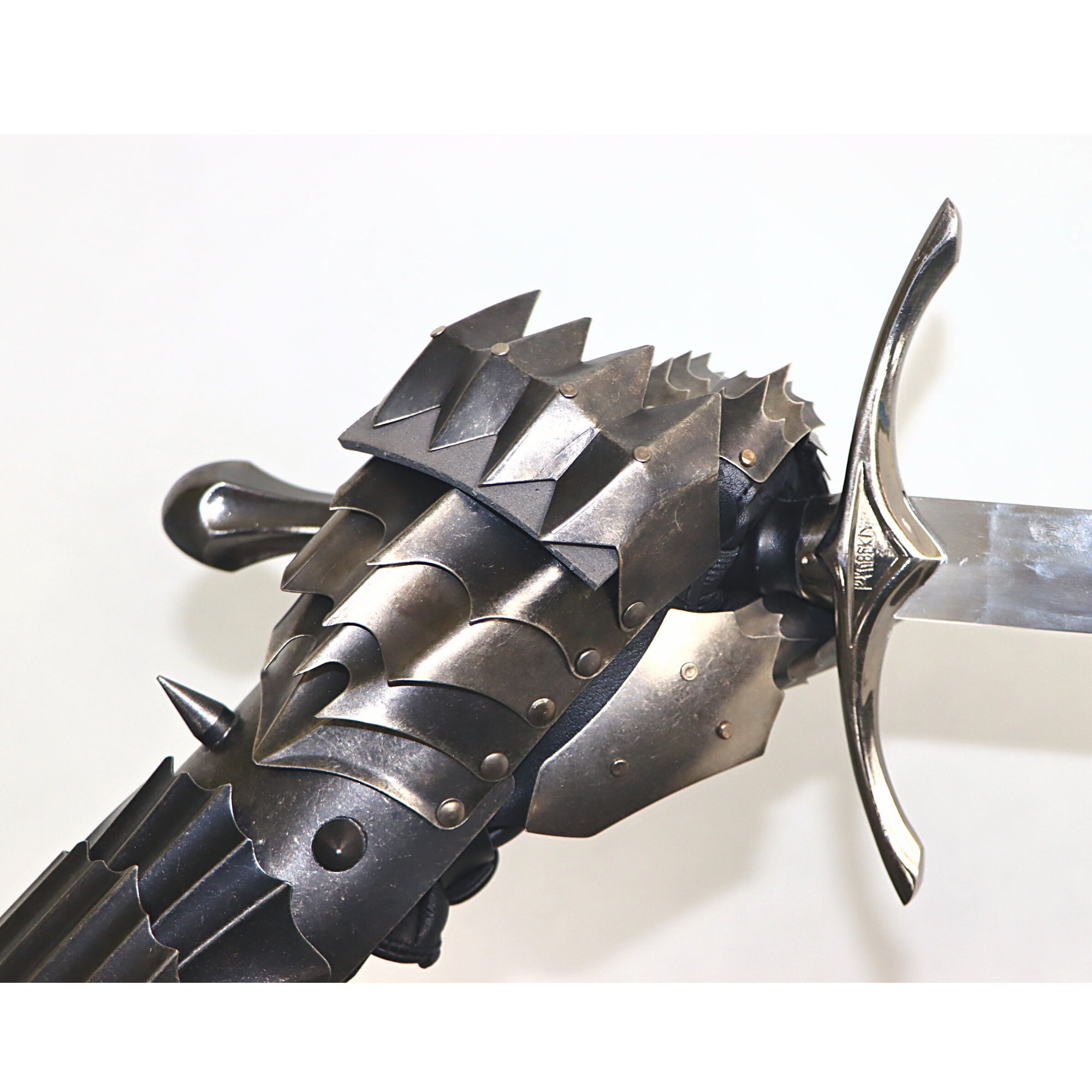 Gauntlet Holding Sword