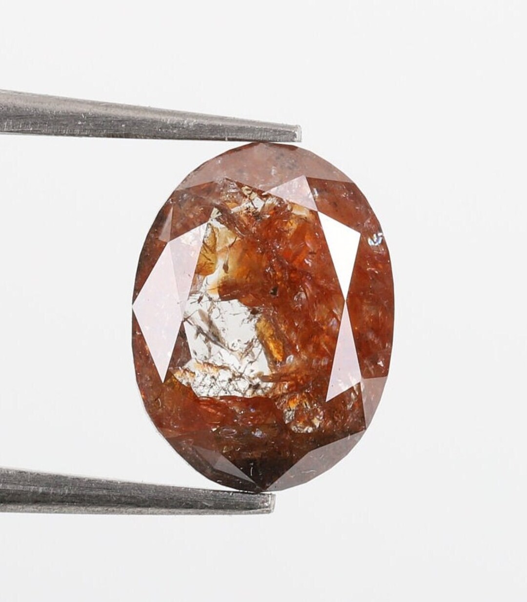 2.47 CT, 9.80 X 7.30 Mm Salt and Pepper Diamond Transparent Oval Shape Fancy Reddish Color ...