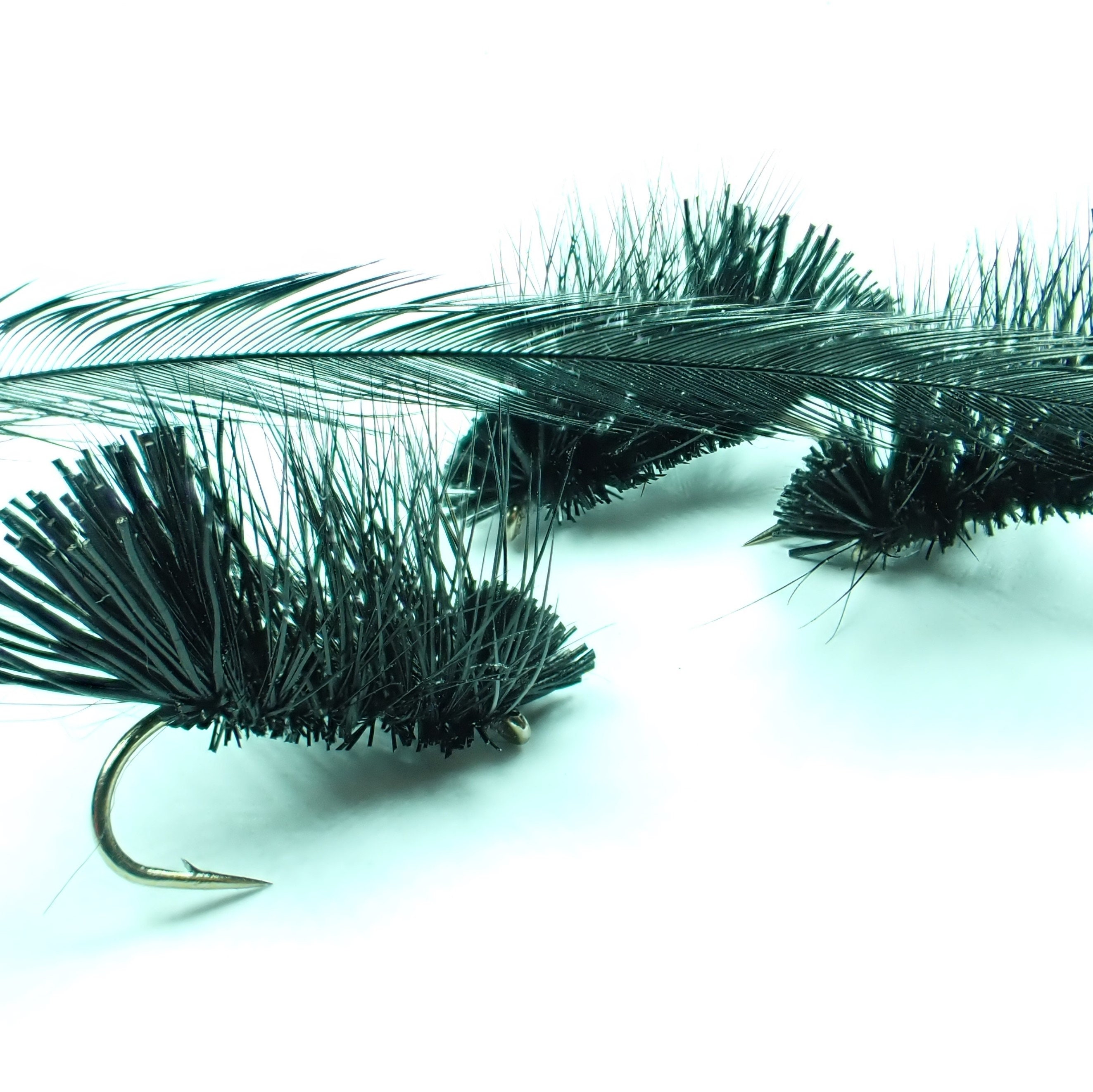 Dyret Hackle Hog, black barbed fishing fly, caddis pattern that will ...