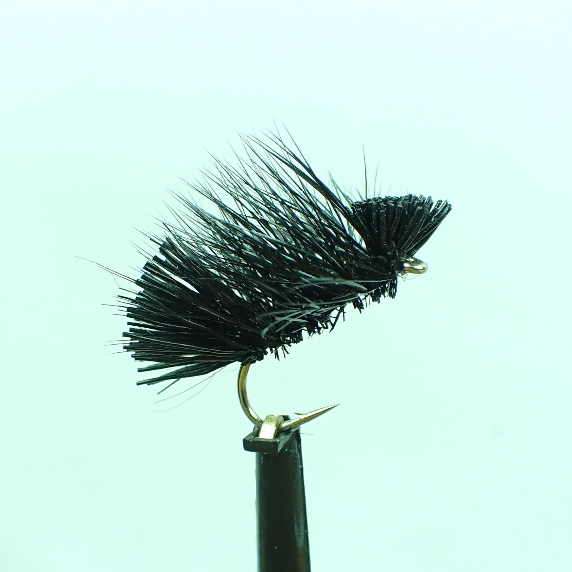 Dyret Hackle Hog, black barbed fishing fly, caddis pattern that will ...