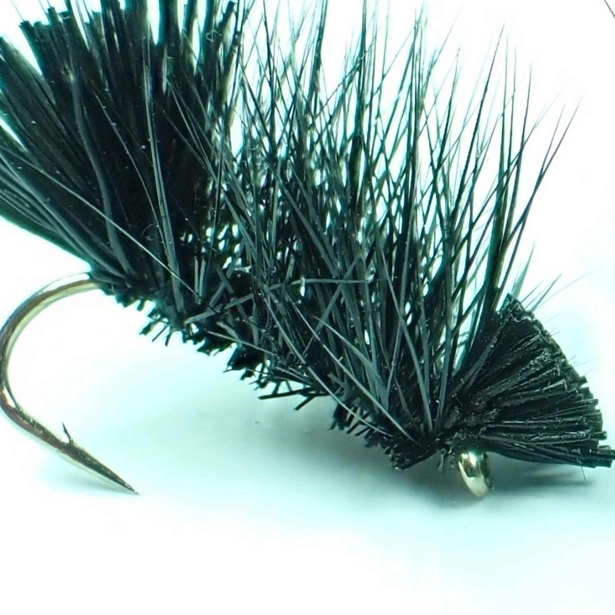 Dyret Hackle Hog, black barbed fishing fly, caddis pattern that will ...