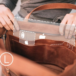 Laptop Bag With a Large Internal Compartment That Can Easily Fit a ...