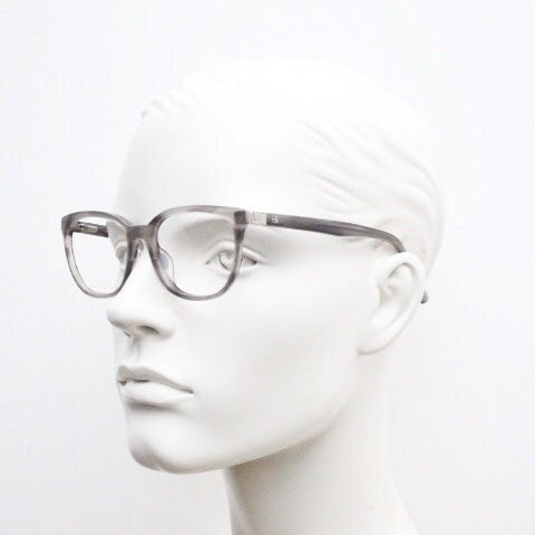 Calvin Klein Rectangular Eye Glasses. Unisex Transparent Grey Gloss ...