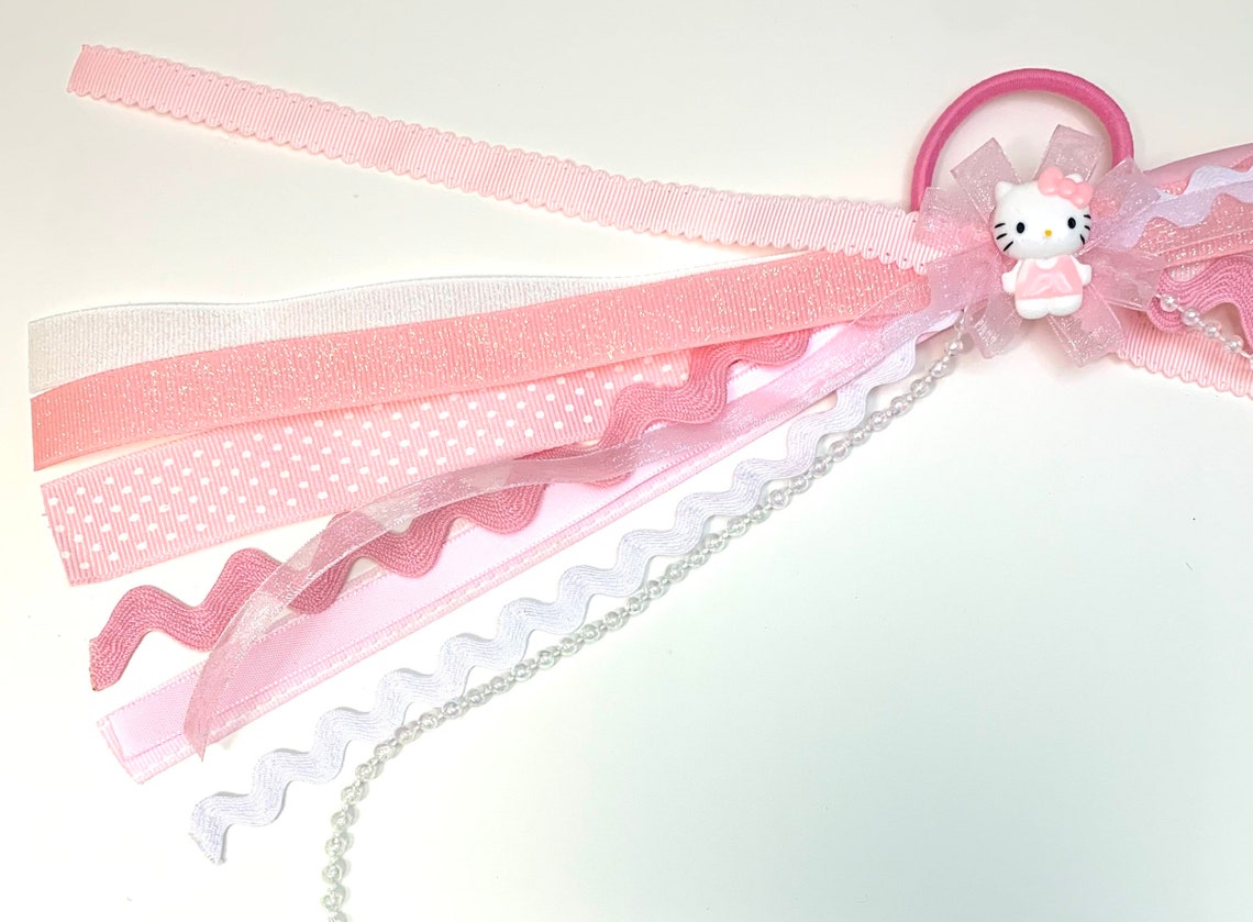 Hello Kitty ribbon pony o | Etsy