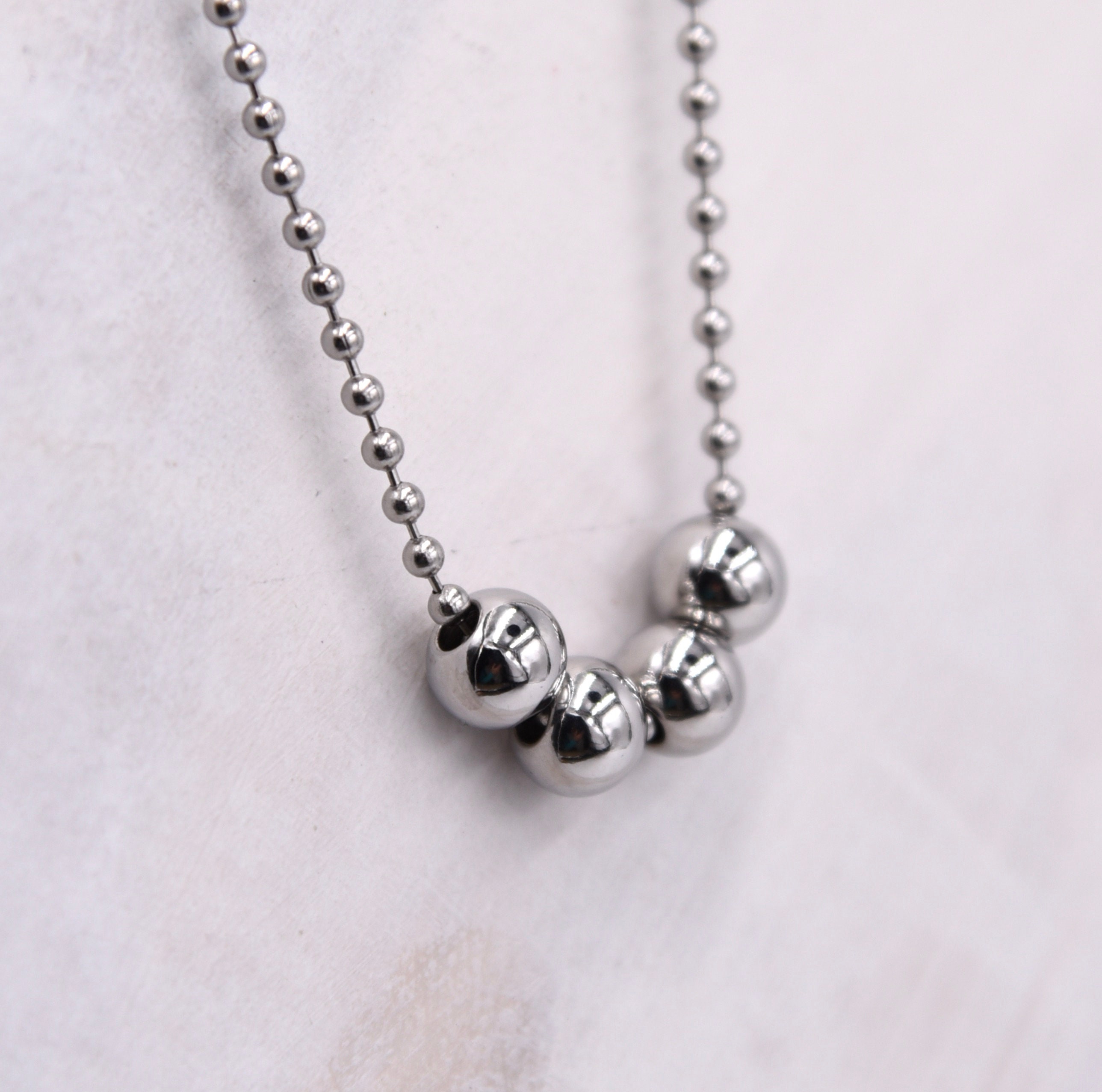 Newton Roll Fidget Collar Collar de ansiedad Fidget joyería Stim Tool ...