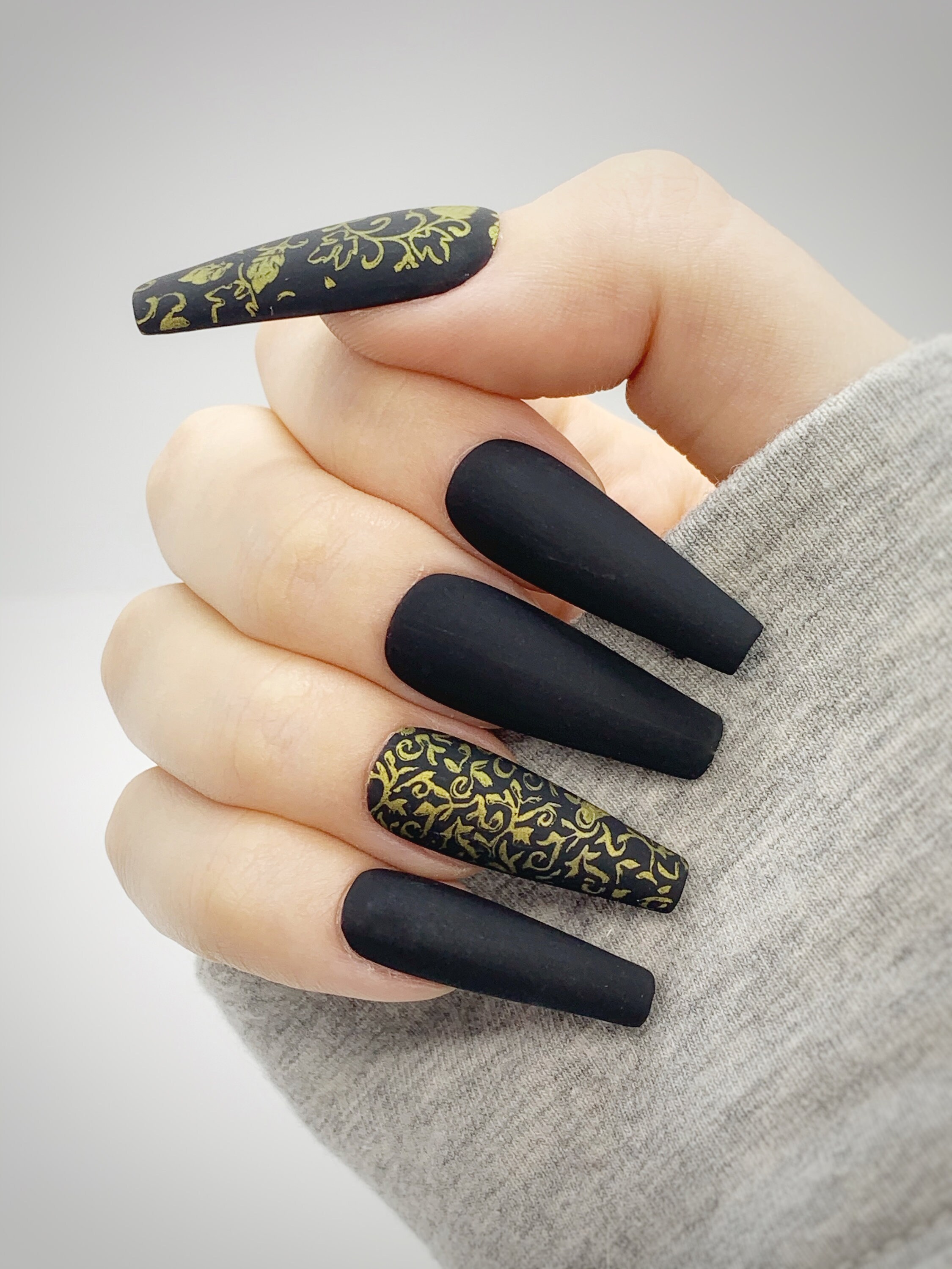 Matte Black And Gold Nail Designs