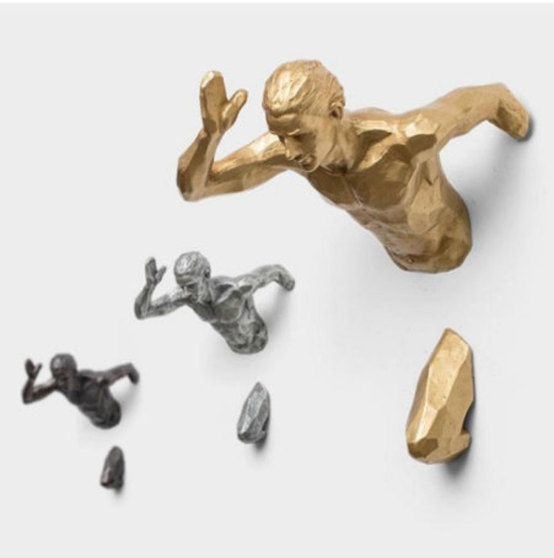 Running Man Wall Statue, Man Getting Out of Wall Statue, Tmanan Man ...