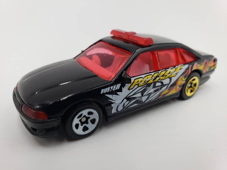 Hot Wheels Holden Commodore Police Cruiser Black Smashville Miniature ...