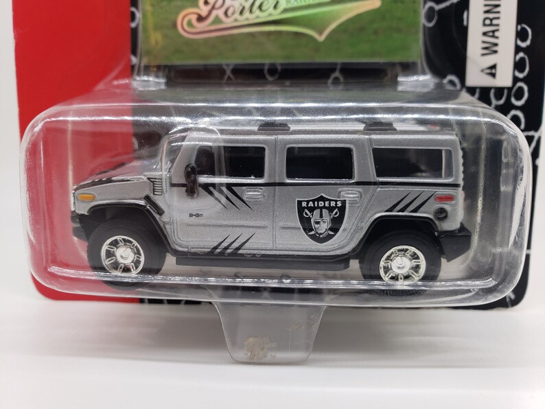 Hummer H2 Raiders Jerry Porter Silver and Black Fleer Collectable Scale ...