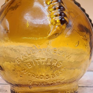 Vintage 1930s Ball and Claw Bitters Bottle - Etsy