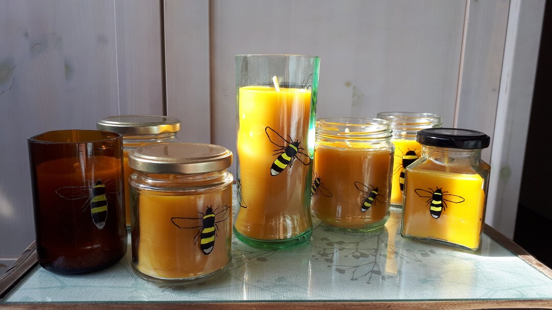 Beeswax candles made from recycled bottles with individual handpainted ...