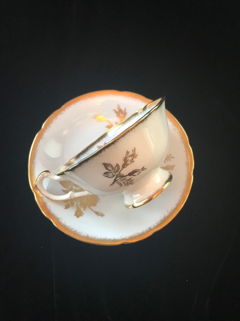 Paragon Tea Cup and Saucer Gold Rose on Pale Blue Background, Widemouth ...