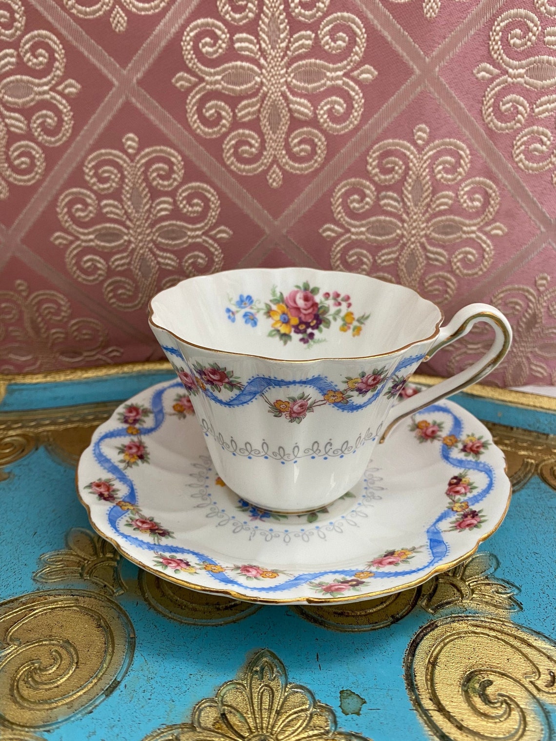 Gladstone blue ribbon tea cup and saucer with swag flowers | Etsy