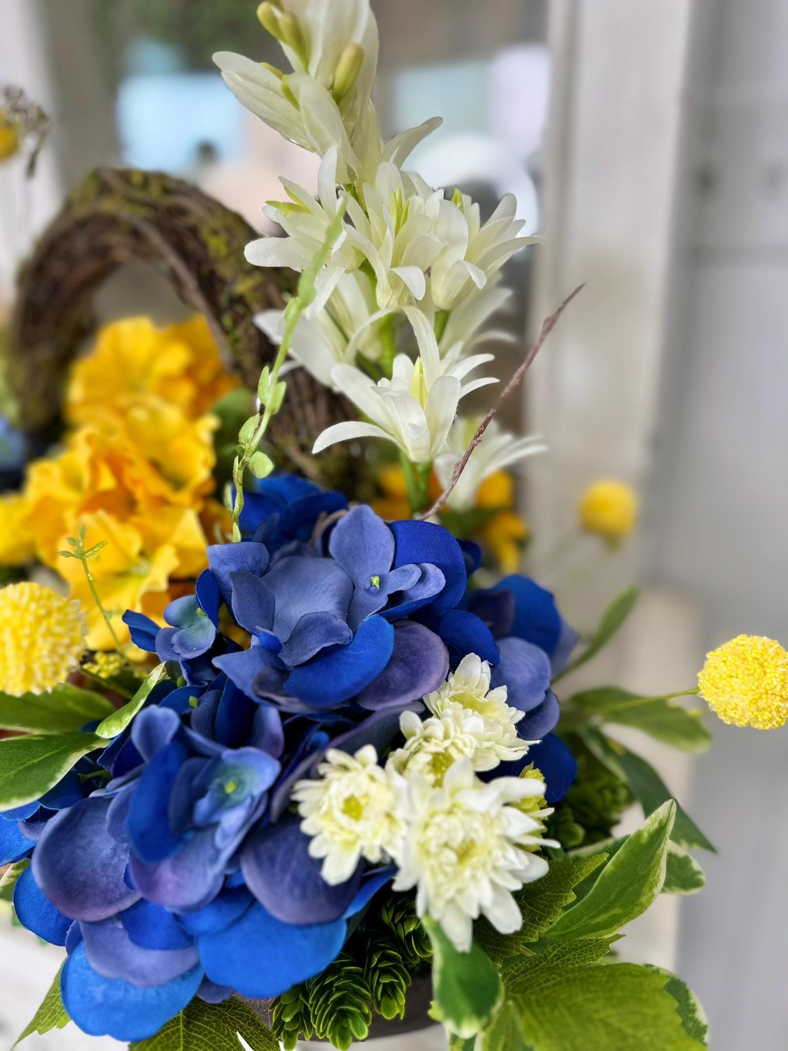 Blue Hydrangea & Yellow Primrose Floral Arrangement in Wooden Dough ...