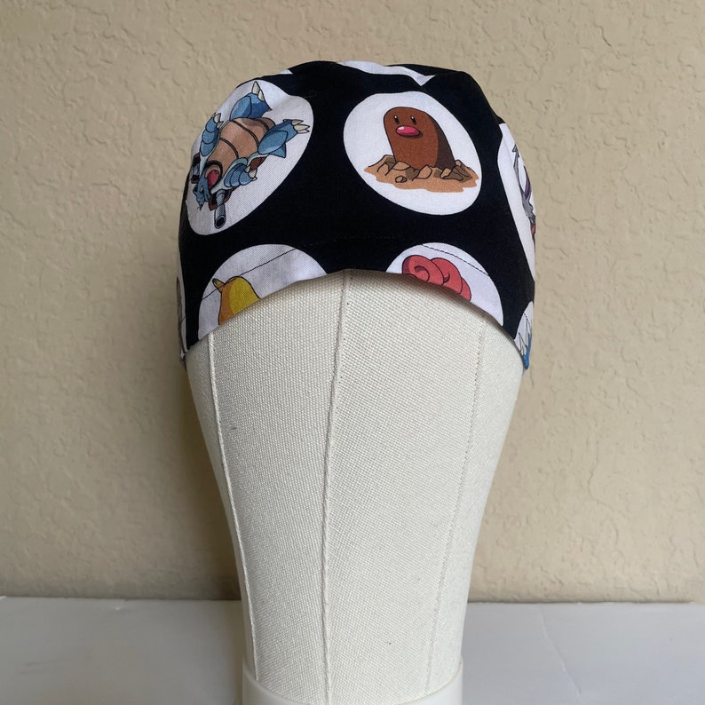 Pokémon Original Mens Surgical Scrub Cap, Black| Indigo League Skull ...