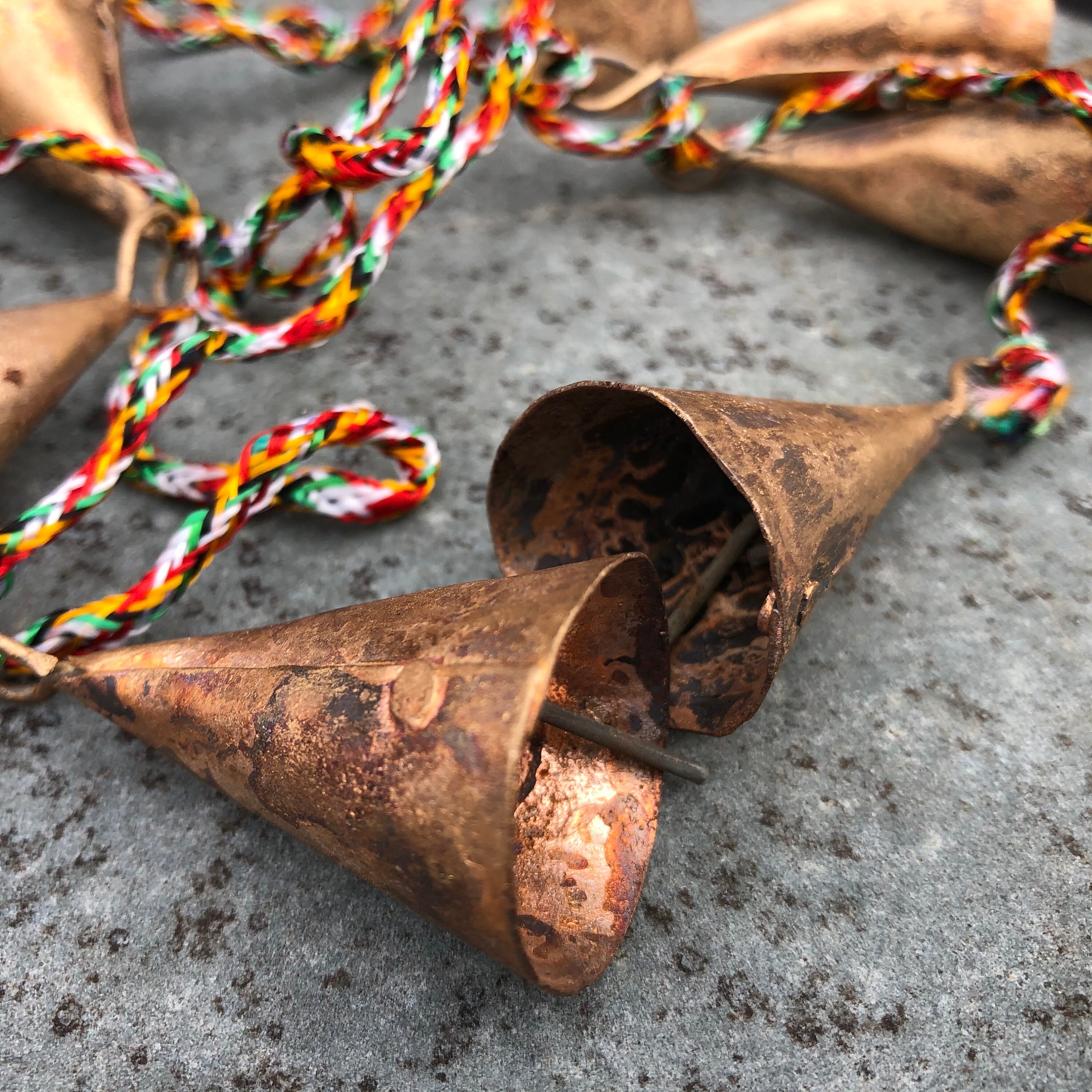 String of 8 Cone Shaped Bells on a Cord | Etsy
