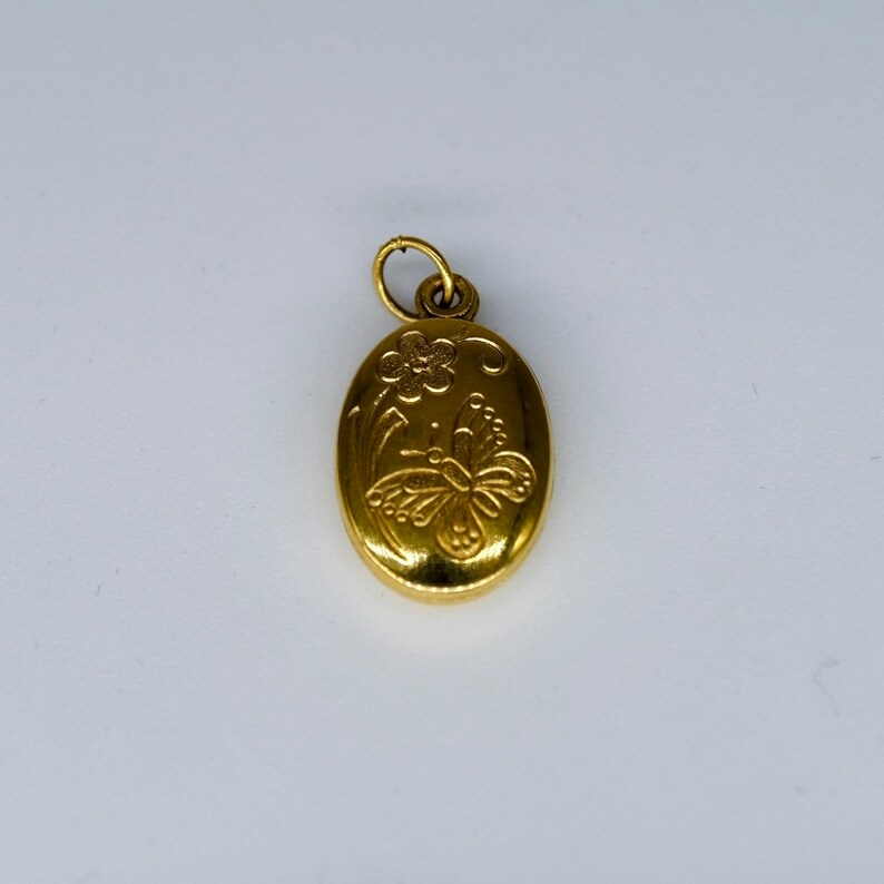 A Cute Little Vintage Sliding Locket Engraved With Butterfly Motif, 9ct ...