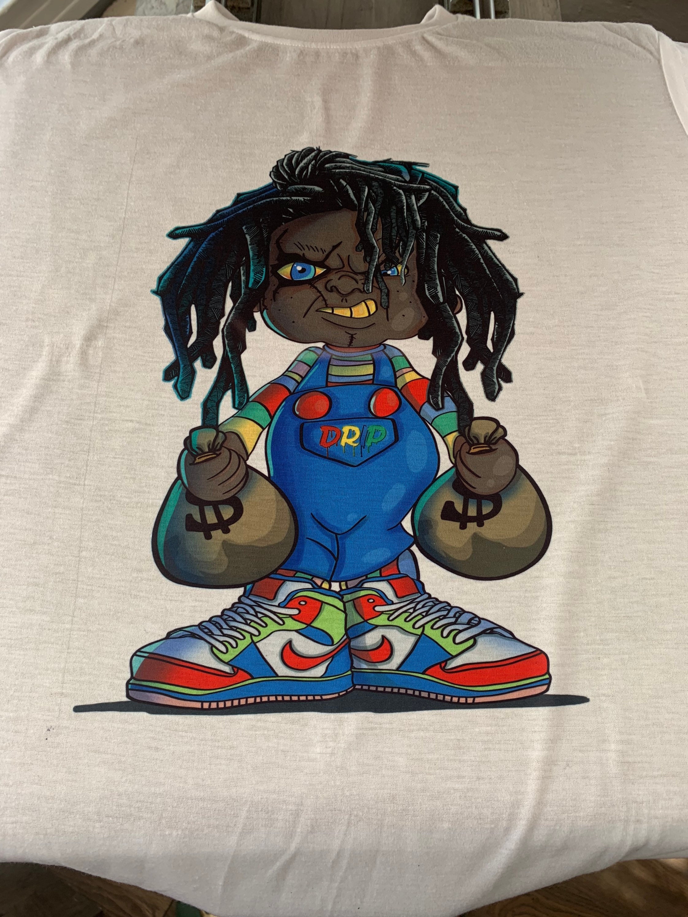 Childs Play Money Bag Chucky Doll T-Shirt, Horror, Sublimation sold by ...
