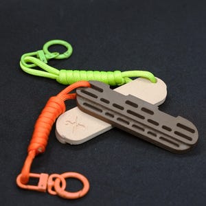 mini-climbing-fingerboard-bag-charm-with-paracord-bouldering