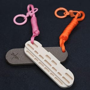 mini-climbing-fingerboard-bag-charm-with-paracord-bouldering