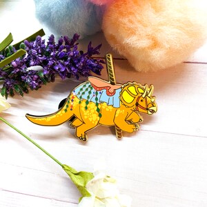 Whimsical Triceratops Dinosaur Carousel Enamel Pin A Jurassic Joyride ...