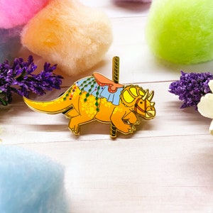 Whimsical Triceratops Dinosaur Carousel Enamel Pin A Jurassic Joyride ...