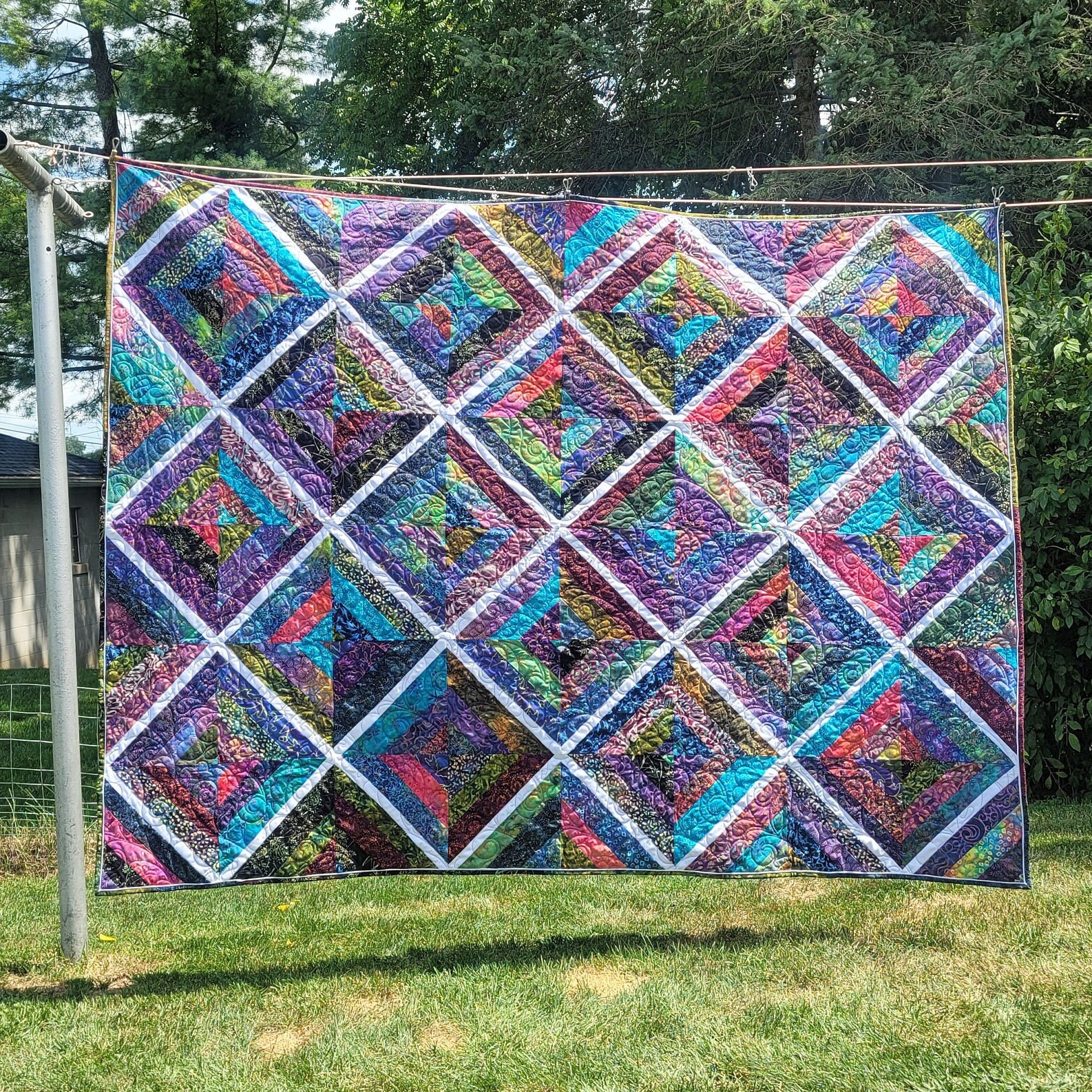 Batik String Quilt Machine Quilted With Swirly Foilage Pattern, Rainbow ...