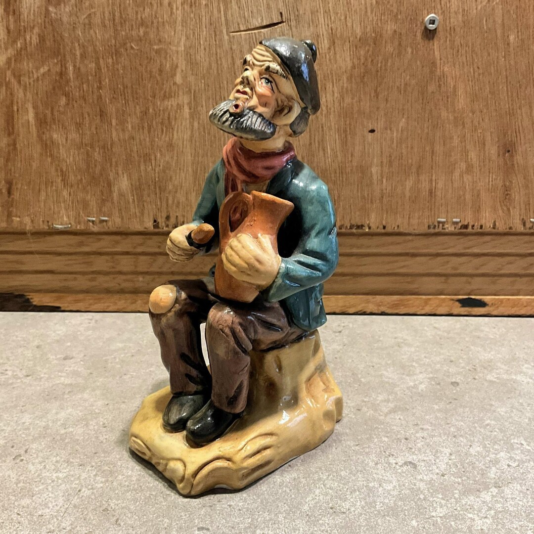 Vintage Ceramic Figurine Depicting an Old Man With a Beard, Holding a ...