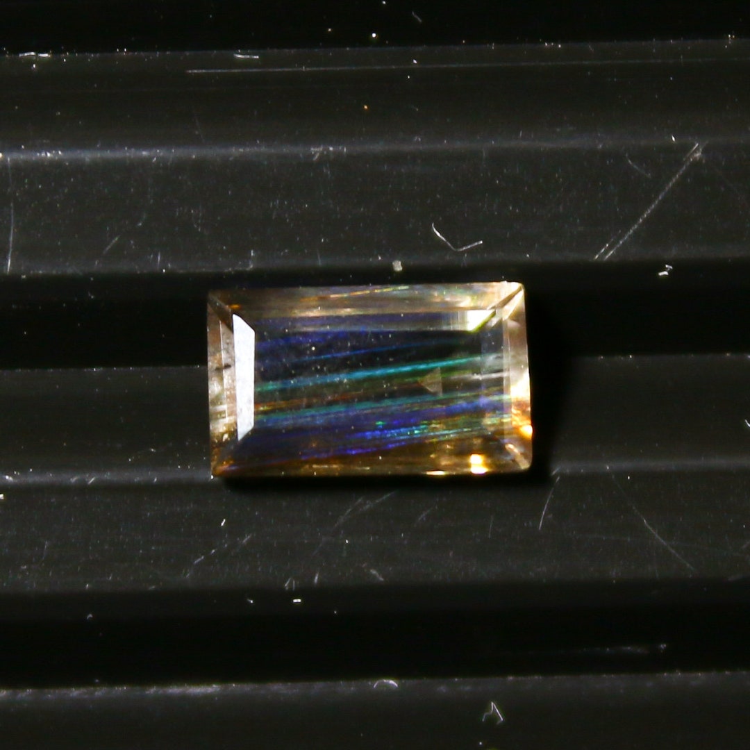 Natural Multi-fire Rainbow Scapolite 1.10 Carat 8.2x5.2 MM Baguette ...