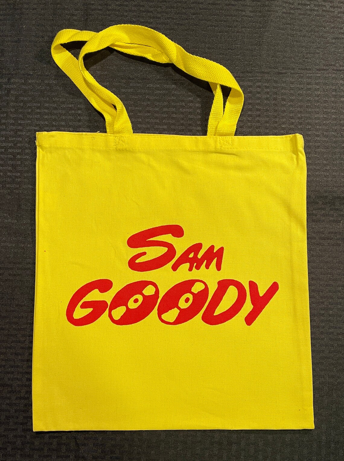 Logotipo de Sam Goody, pesado 12oz, reutilizable, tamaño mediano, bolsa ...