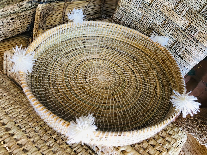 Handmade Sweetgrass Baskets Are Traditional Crafts That Are Made by ...