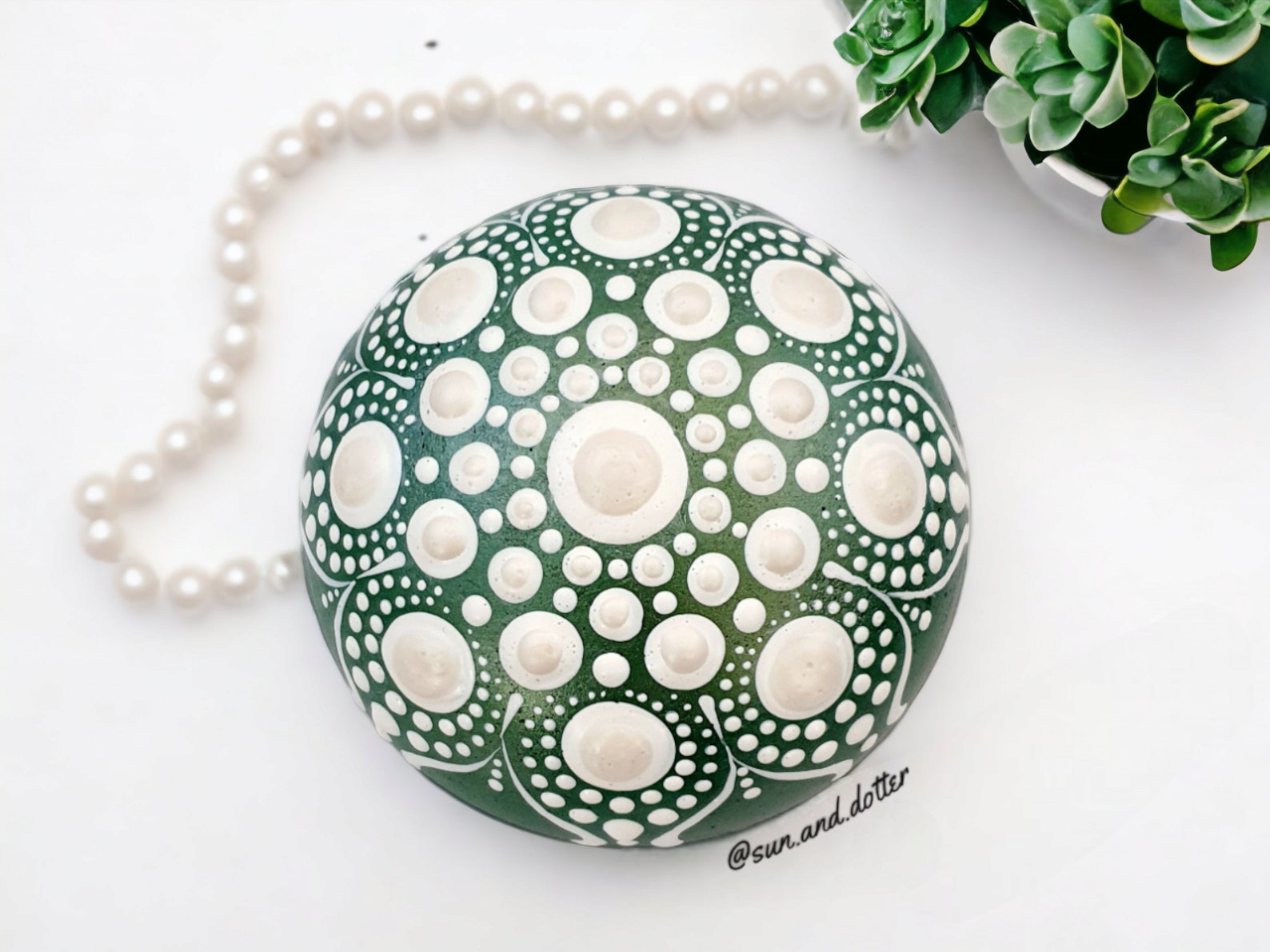 Emerald Stardust Mandala Stone - A Hand Painted Mandala Stone in a ...