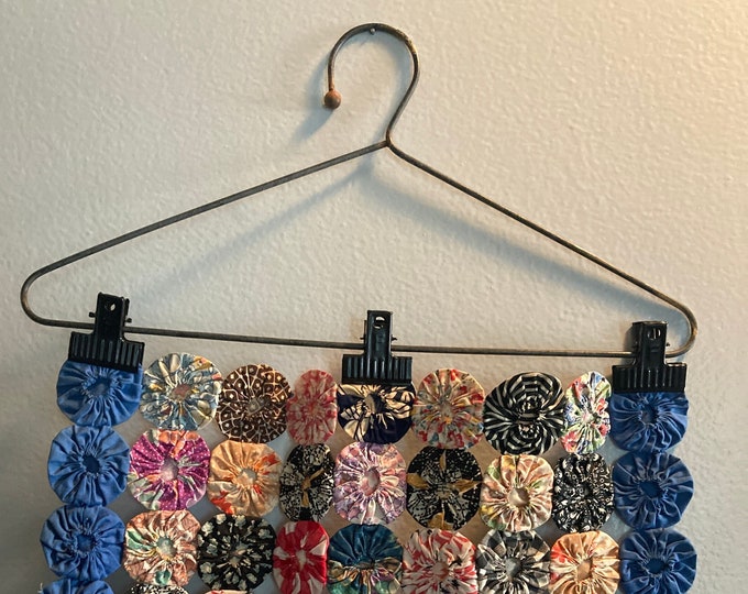 Vintage Yo-yo Quilt Block Held With Metal Clips on a Rusty Wire Hanger ...