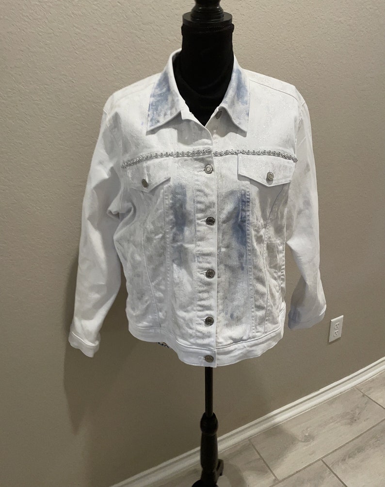 Casual White Distressed Denim Jacket With Silver Accents and a Water ...