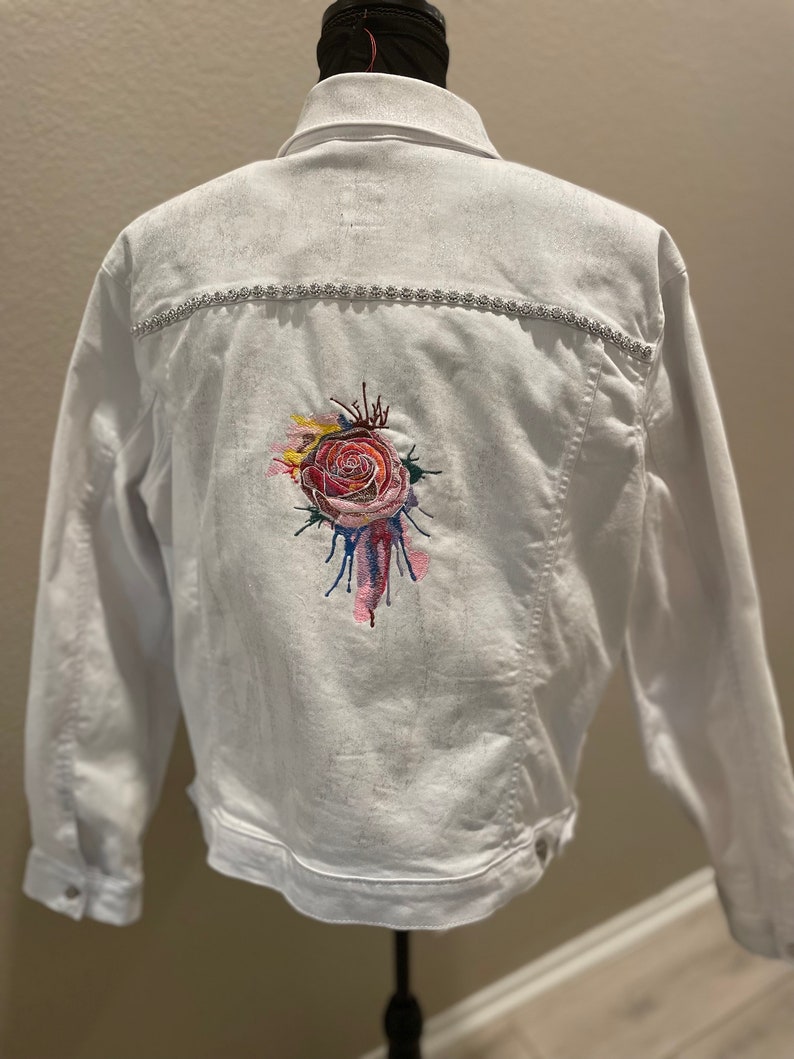 Casual White Distressed Denim Jacket With Silver Accents and a Water ...